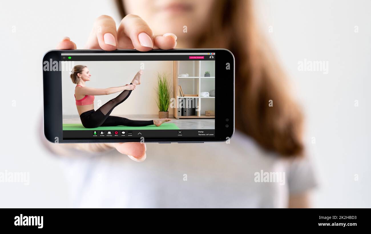 Fitness online. Virtual gym. Home workout. Girl hand showing athletic ...