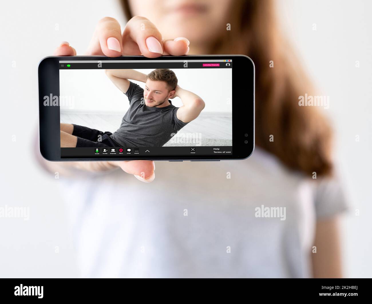 Virtual fitness class. Online training. Workout tutorial. Girl hand ...