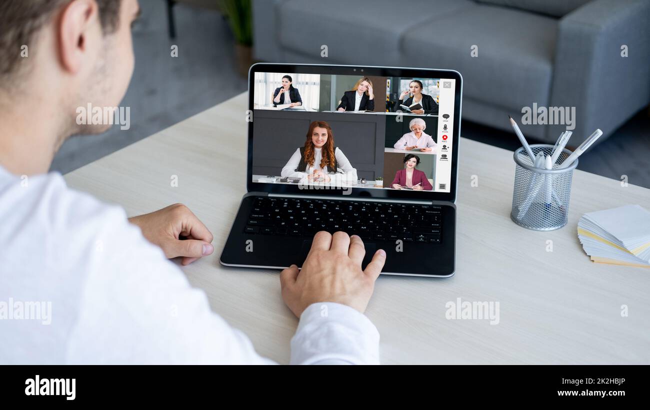 Web conference. Group video call. Distance communication. Male employee ...