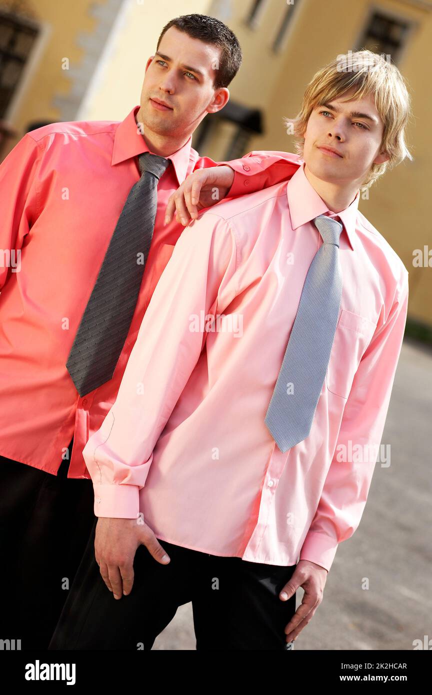 Two men look into the distance Stock Photo - Alamy