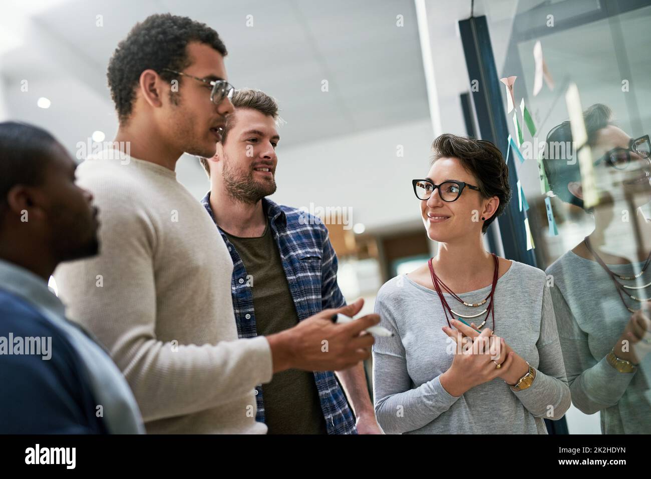 We have to plan together to plan better. Shot of a group of designers ...