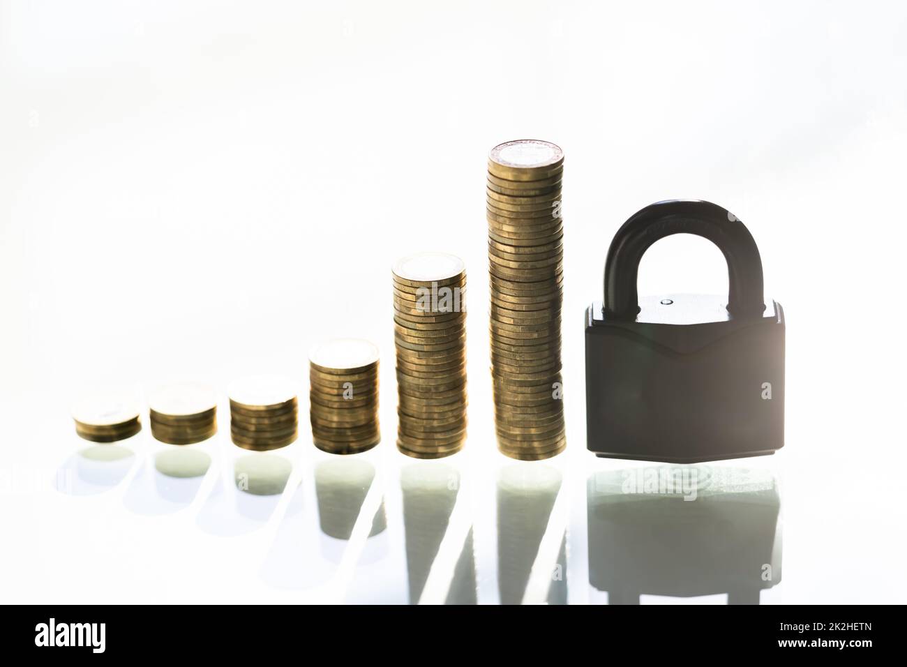 Salary Protection And Money Security. Coin Stack Stock Photo - Alamy