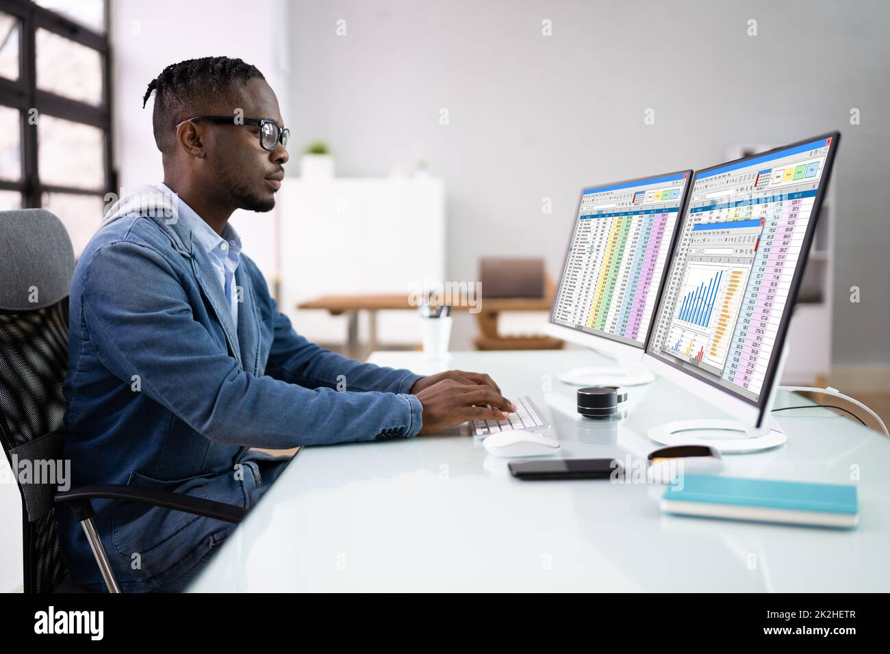 Financial Analyst Using Spreadsheet Software Stock Photo - Alamy