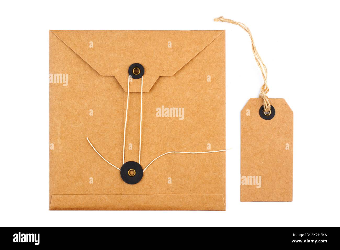 set of craft paper tag and envelope with textile thread isolated on ...