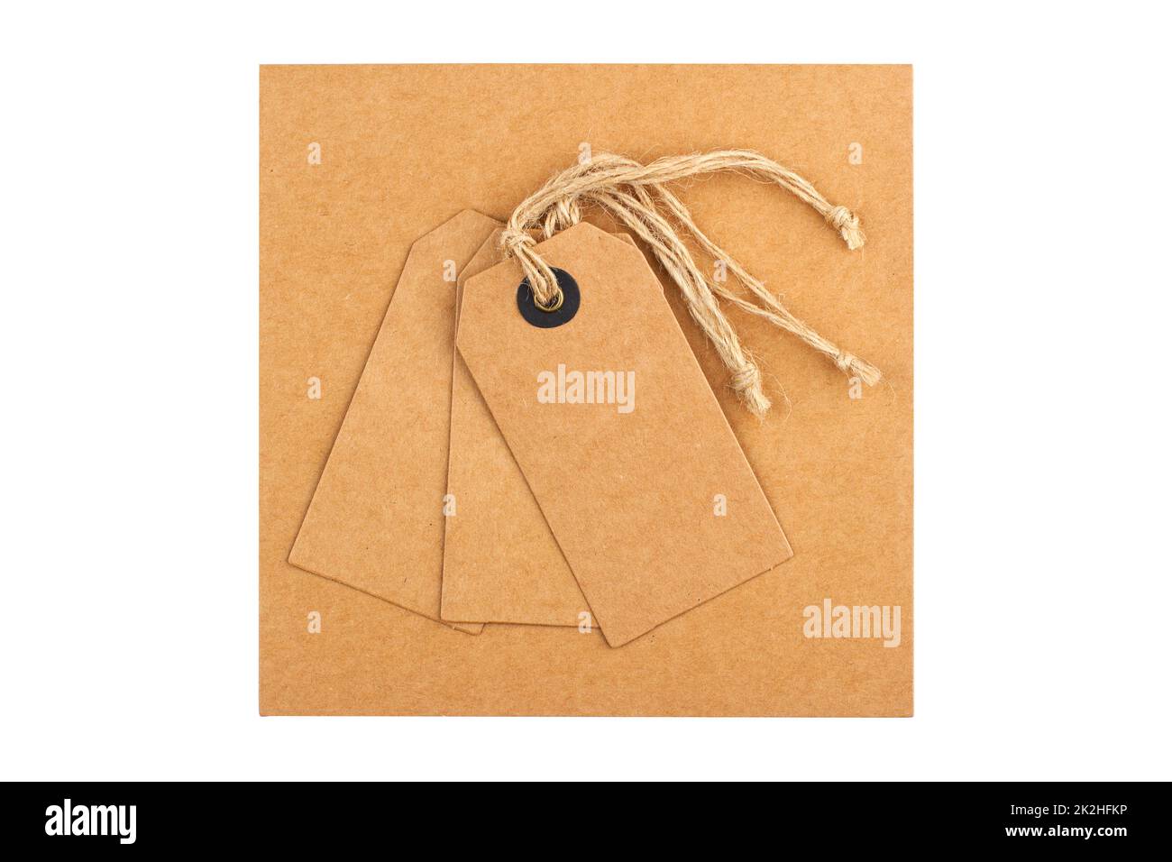 set of craft paper tag and envelope with textile thread isolated on ...