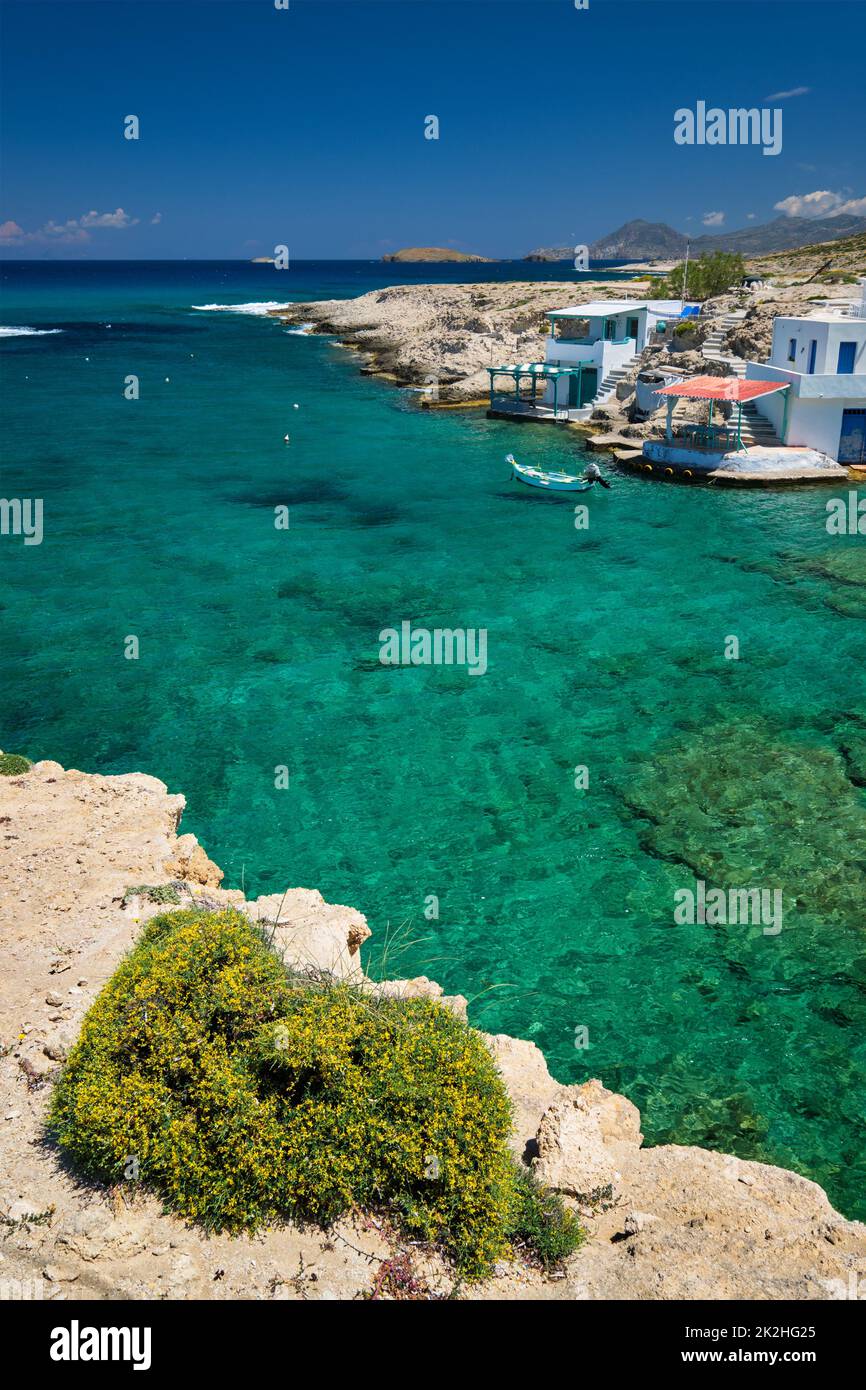 Crystal clear blue water at MItakas village beach, Milos island, Greece ...