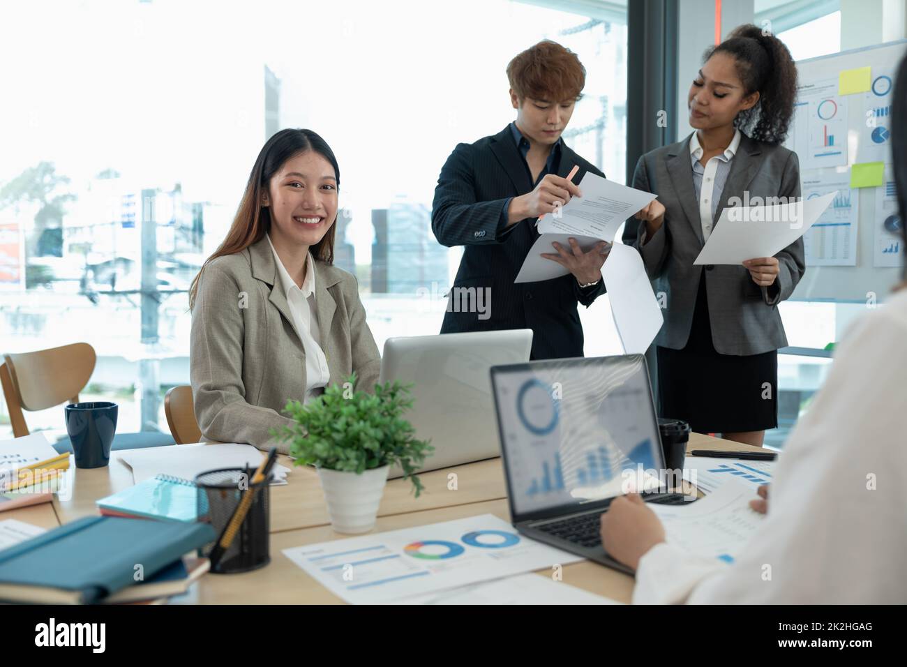 Diverse business people partners group negotiating at boardroom meeting ...