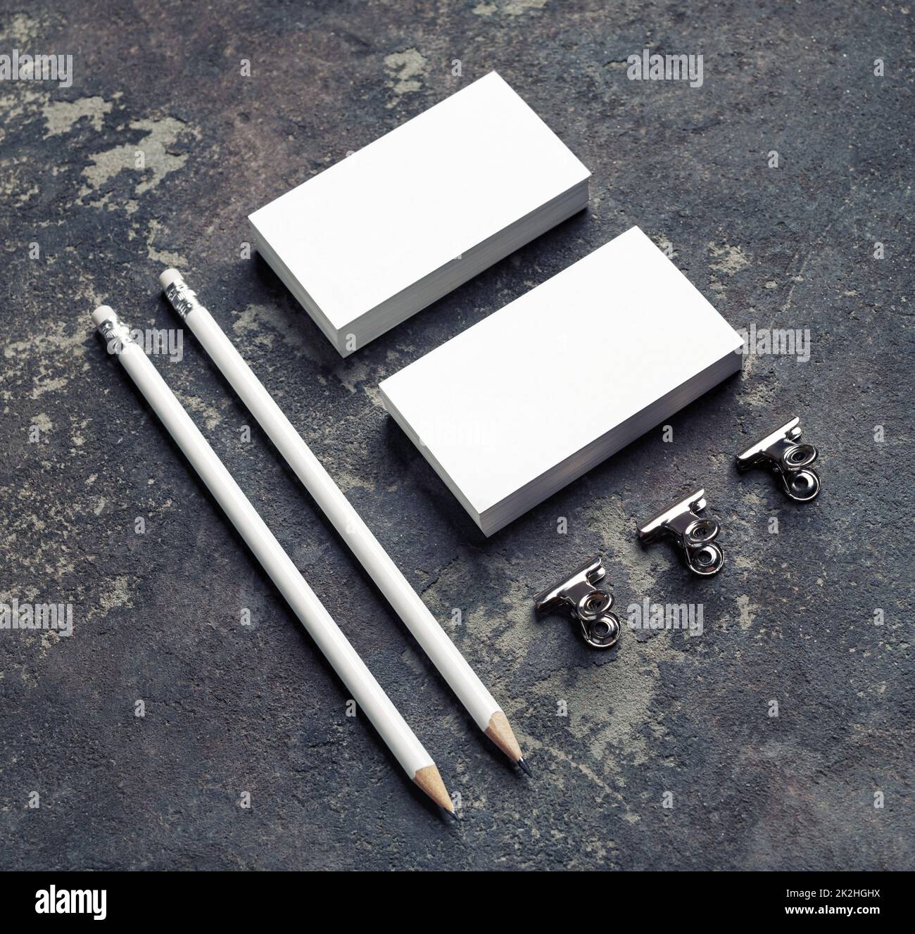 Business cards, pencils and clips Stock Photo - Alamy