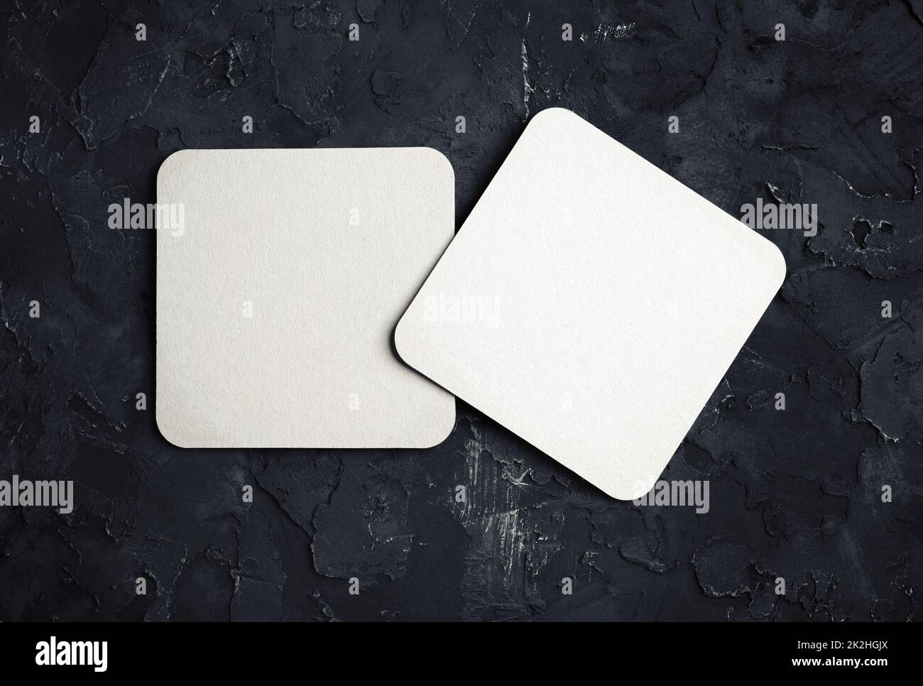 Two square beer coasters Stock Photo - Alamy