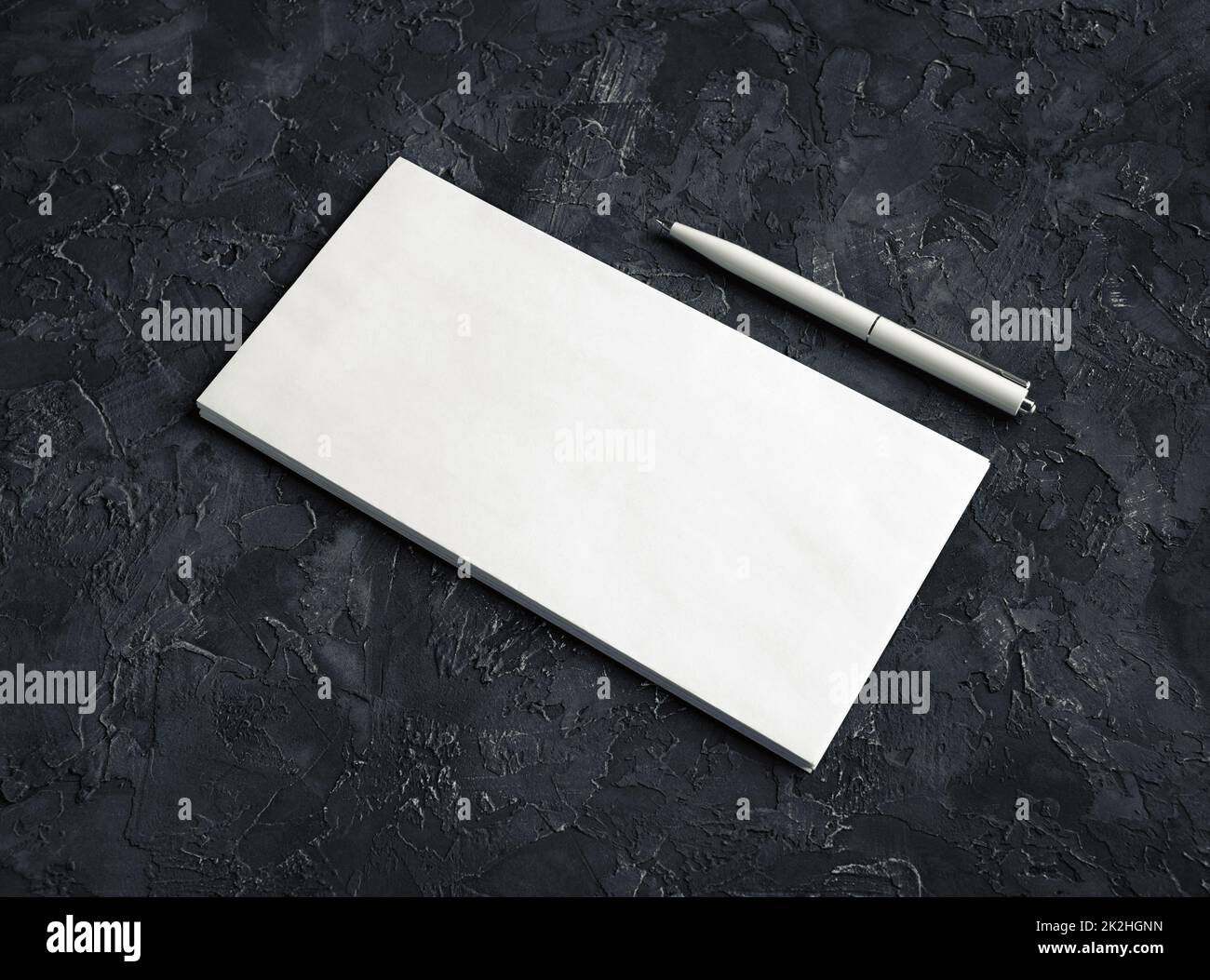 Paper envelope and pen Stock Photo - Alamy