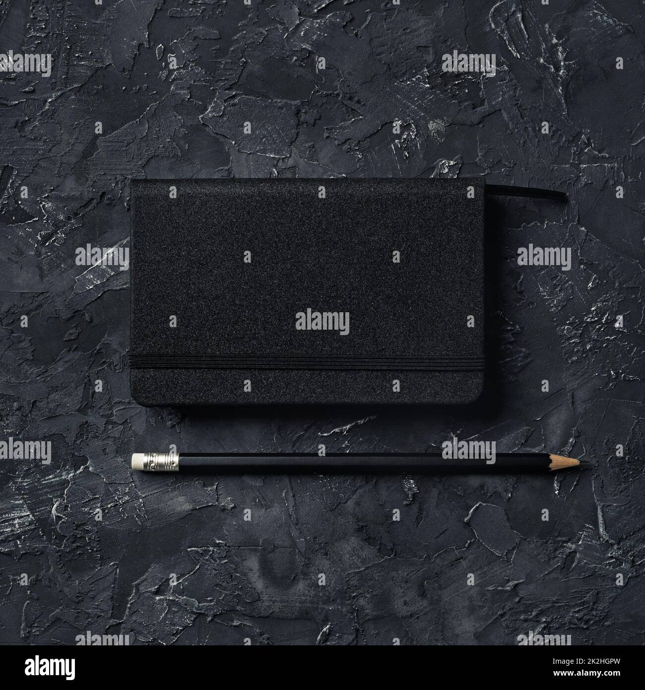 Blank black notebook, pencil Stock Photo - Alamy