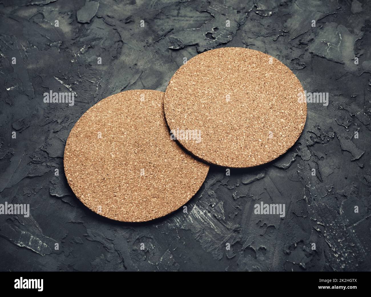Two cork coasters Stock Photo - Alamy