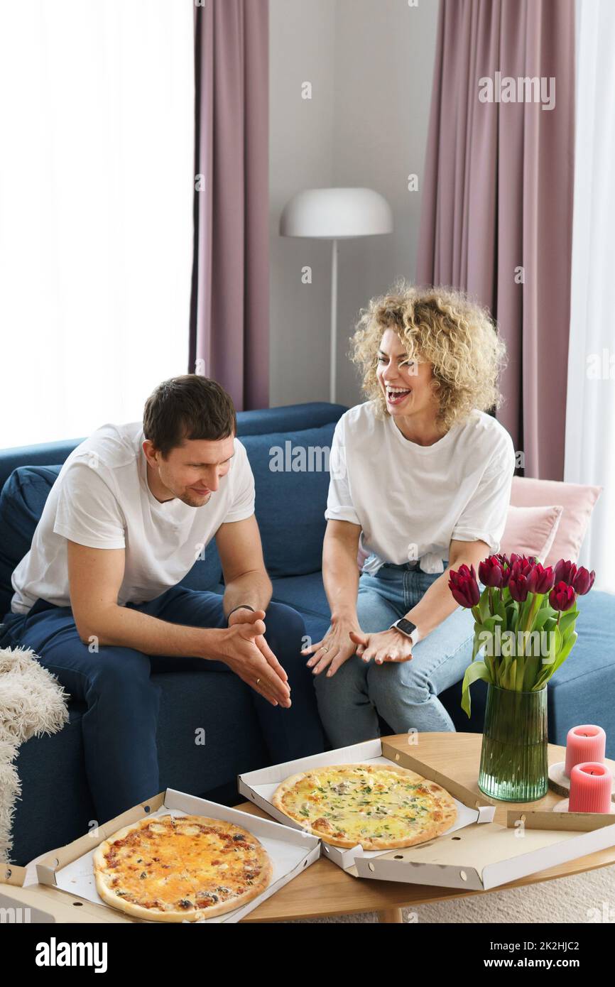 Couple eating at home table hi-res stock photography and images - Alamy