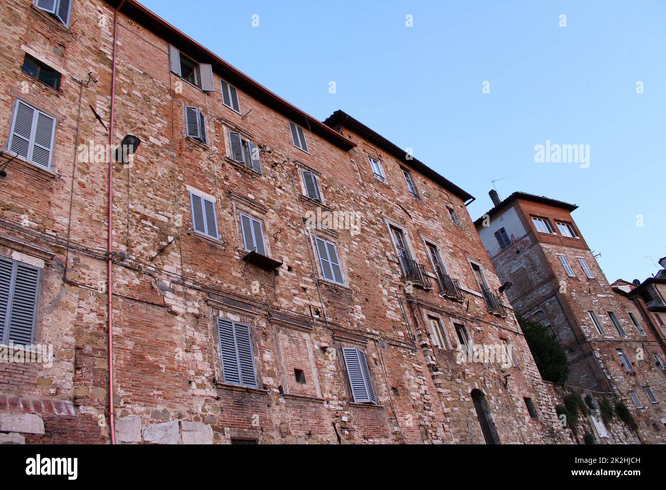 The historical stone buildings in the center of Perugia in Umbria Stock ...