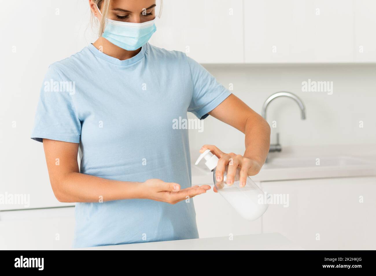Using antibacterial liquid hi-res stock photography and images - Alamy