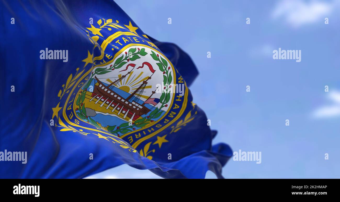 The US state flag of New Hampshire waving in the wind Stock Photo - Alamy