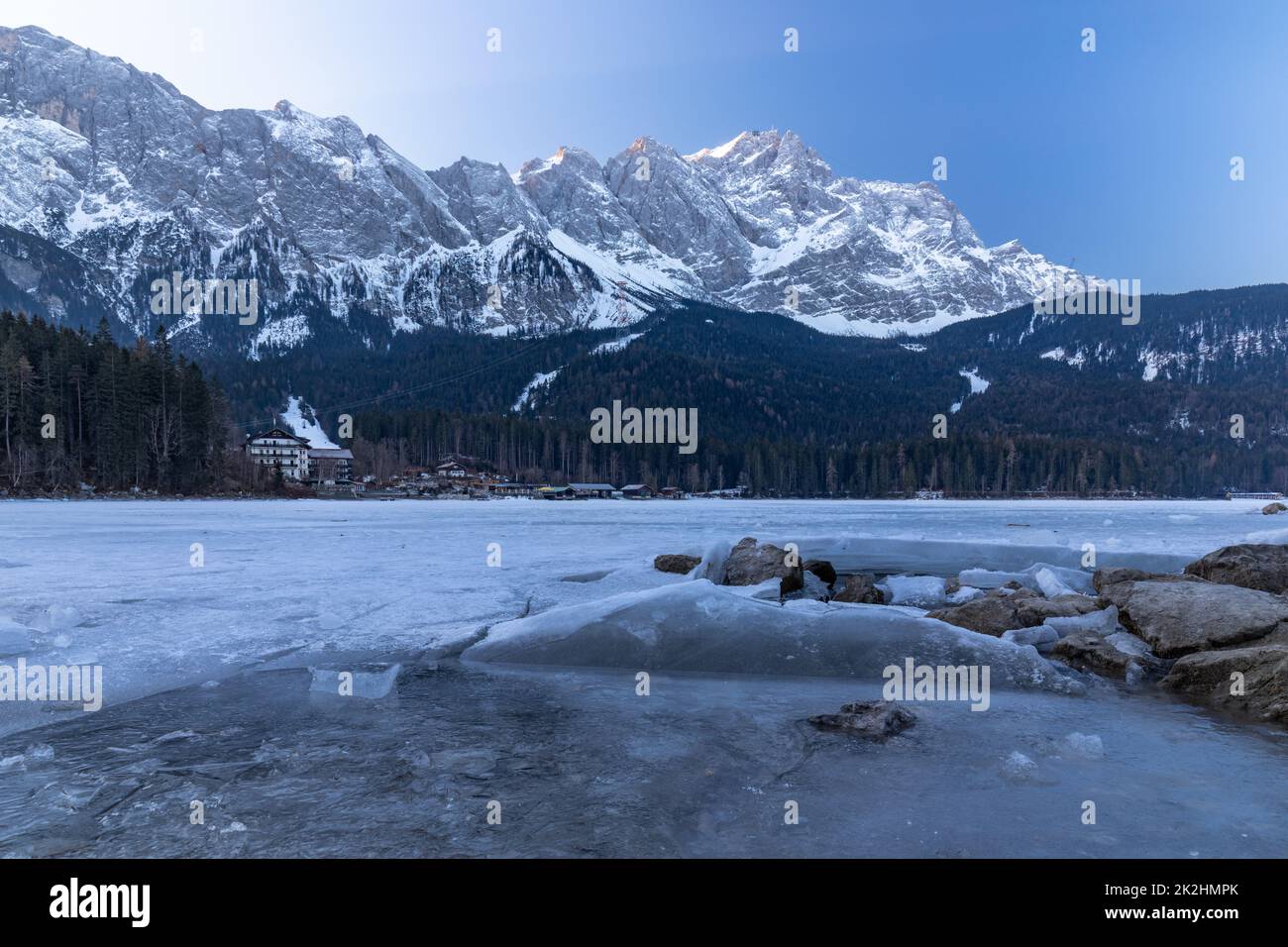 Cold morning at frozen lake Eibsee, Bavaria, Germany, in front of ...