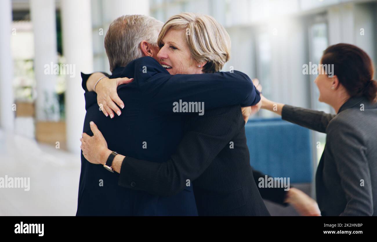 Team hugging hi-res stock photography and images - Alamy
