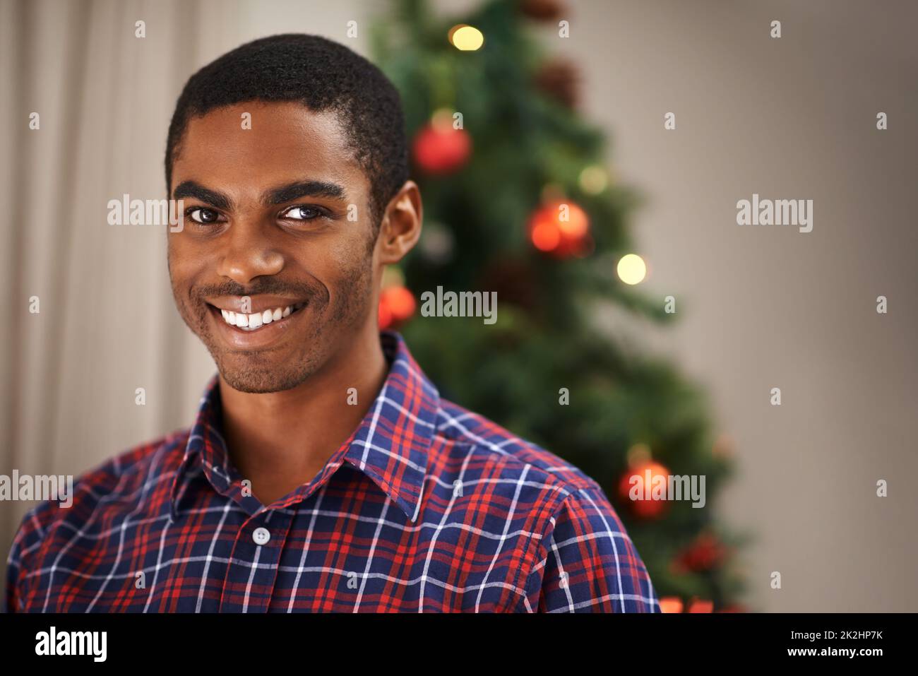 Christmas is my favourite time of year. a handsome young man getting ...