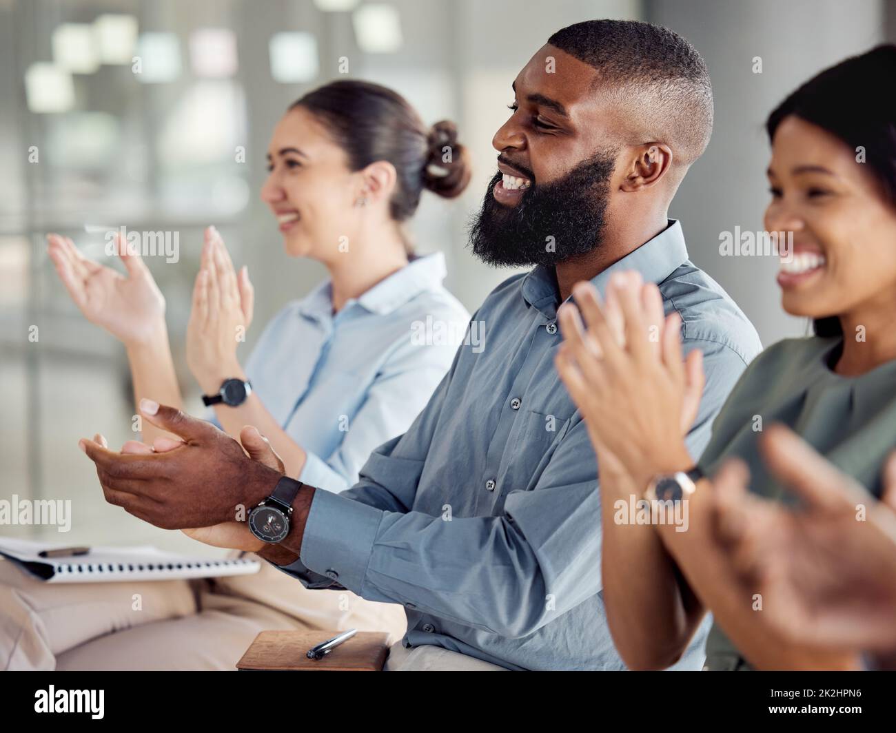 Applause, motivation and success with a business team clapping during a ...