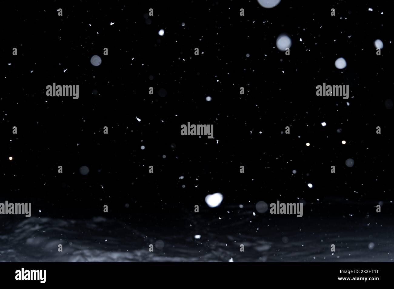 Element for winter design or overlay. Real snow over black background ...