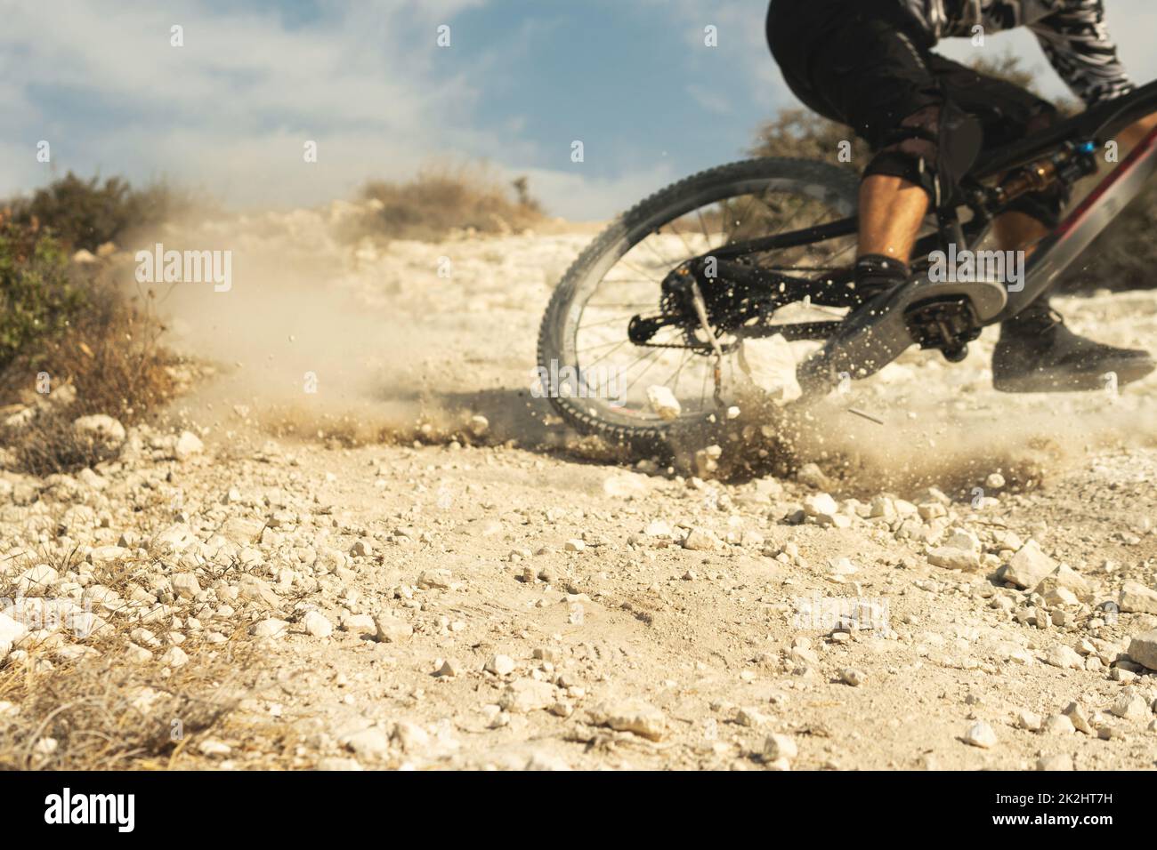 Professional bike rider during downhill ride on his bicycle Stock Photo ...