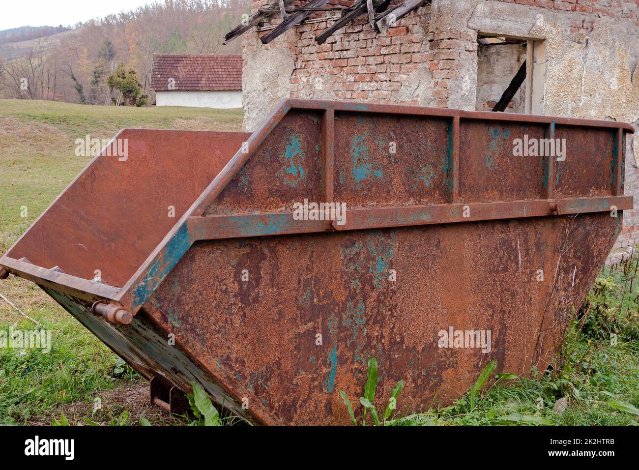 Rusty metal container in field outdoors Stock Photo - Alamy