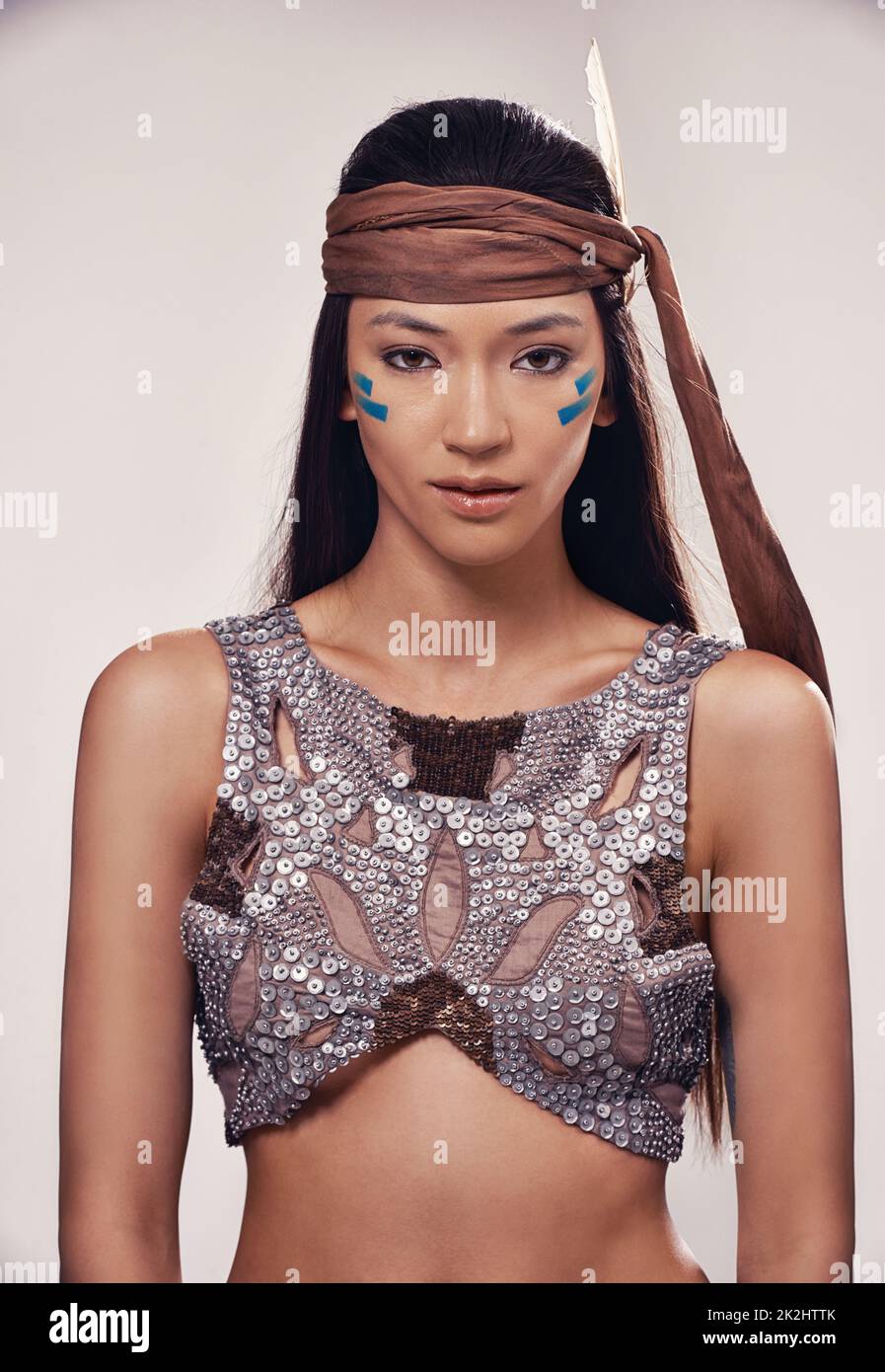 Beauty in the tribe. Studio portrait of an attractive young native american styled woman Stock ...