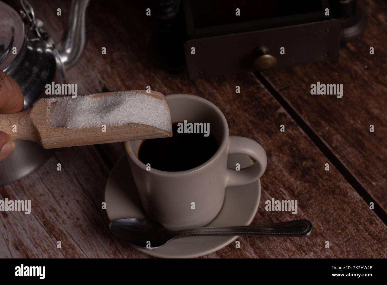 Man hand adding sugar coffee hi-res stock photography and images - Alamy
