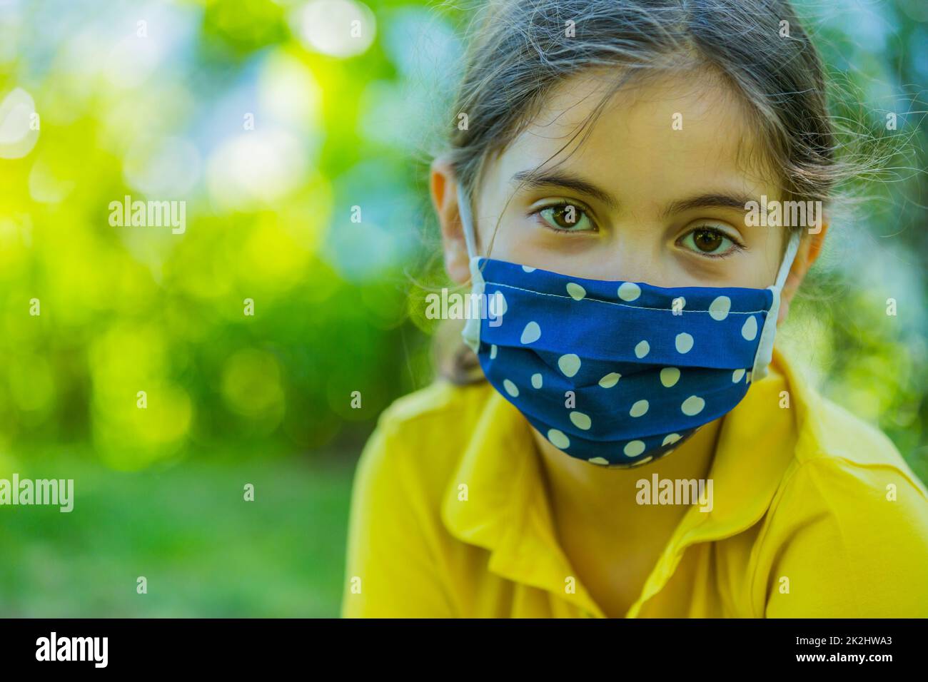 Little girl with mask Stock Photo - Alamy