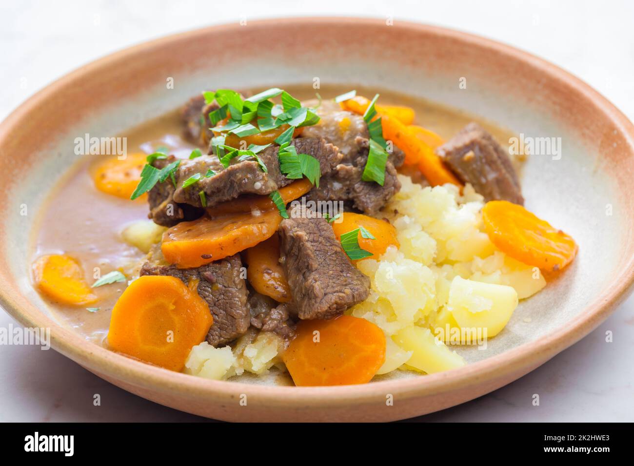 beef stew with carrot and mashed potatoes Stock Photo - Alamy