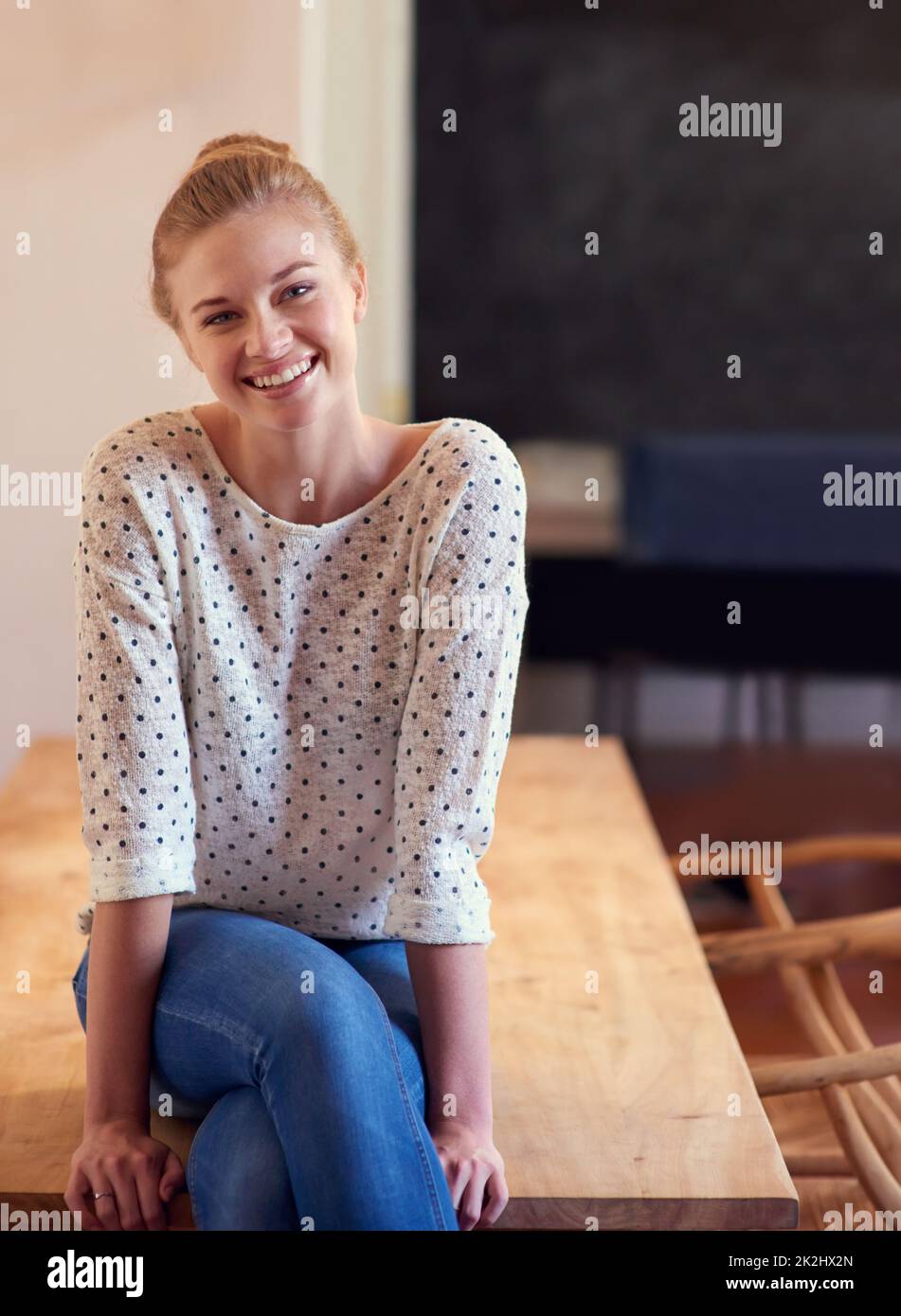 Woman sitting alone at table hi-res stock photography and images - Alamy