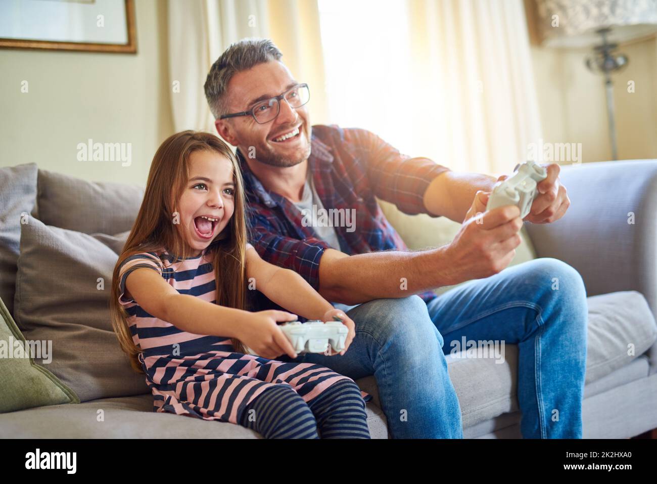 Dad and daughter and sofa hi-res stock photography and images - Alamy