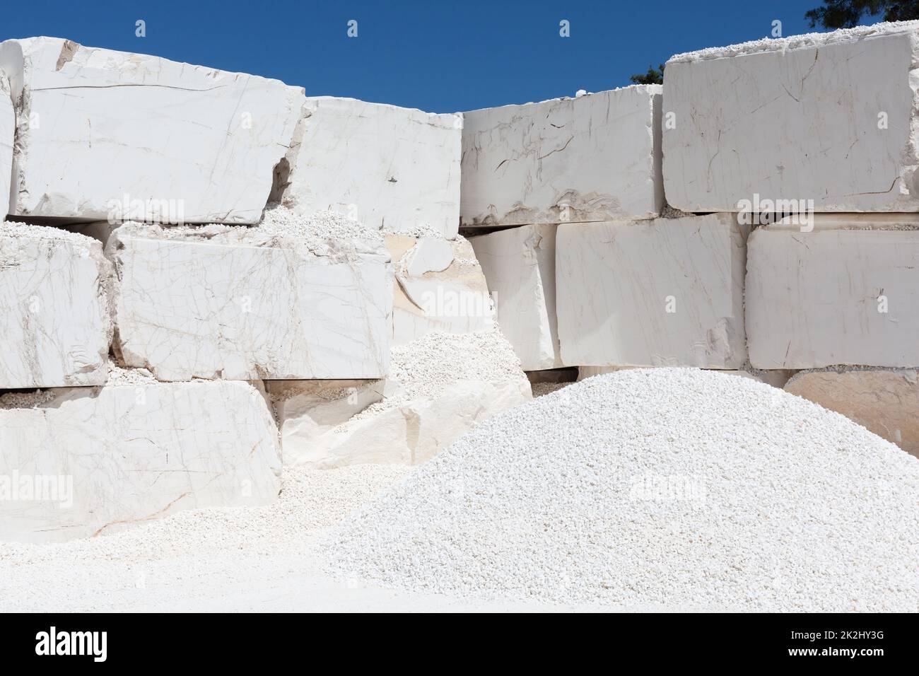 Big white blocks of raw marble from a quarry Stock Photo - Alamy