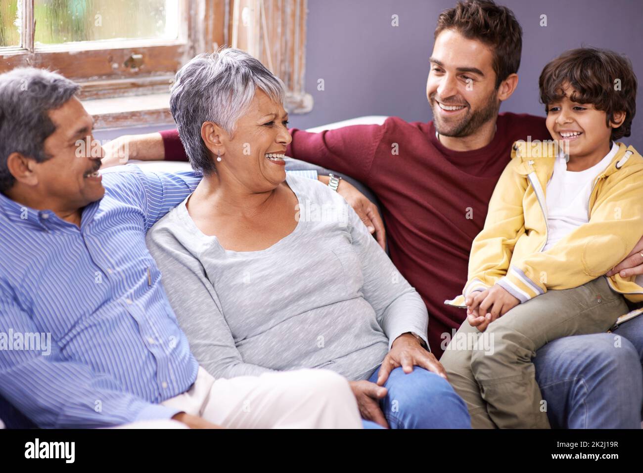Sharing childhood memories with his son. a family bonding together in ...