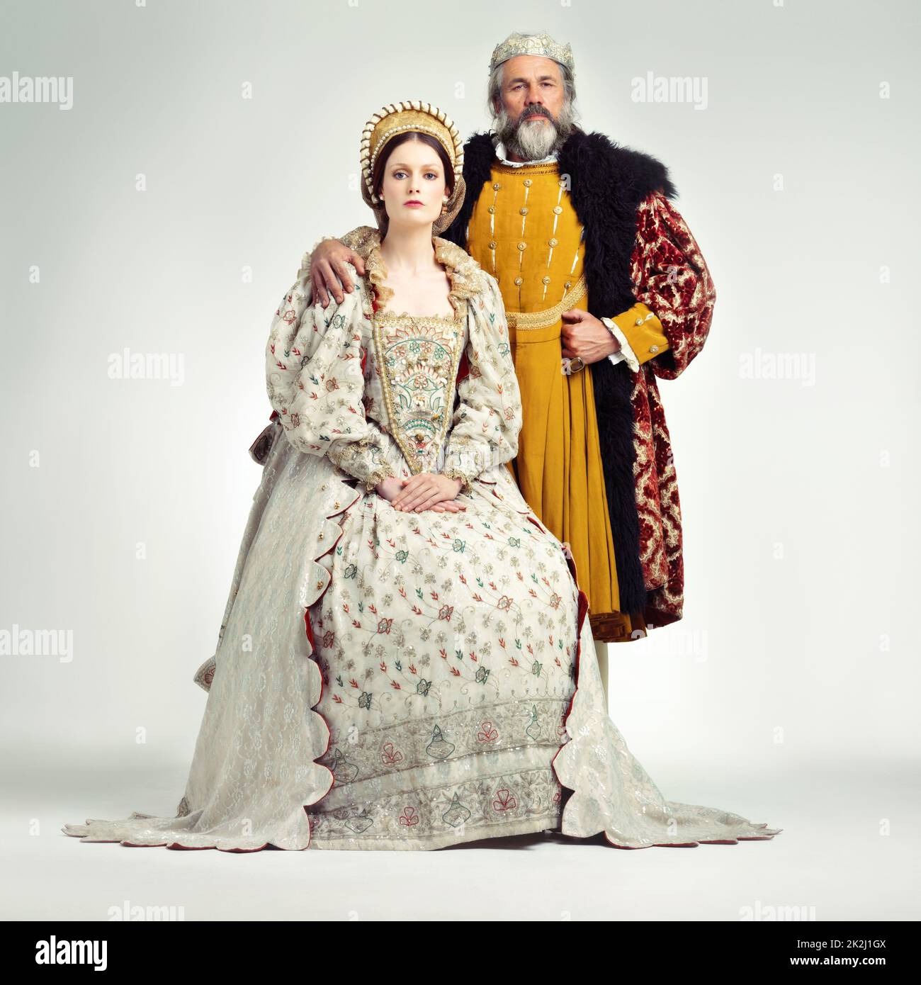 The Royals. Studio shot of a regal king and queen Stock Photo - Alamy