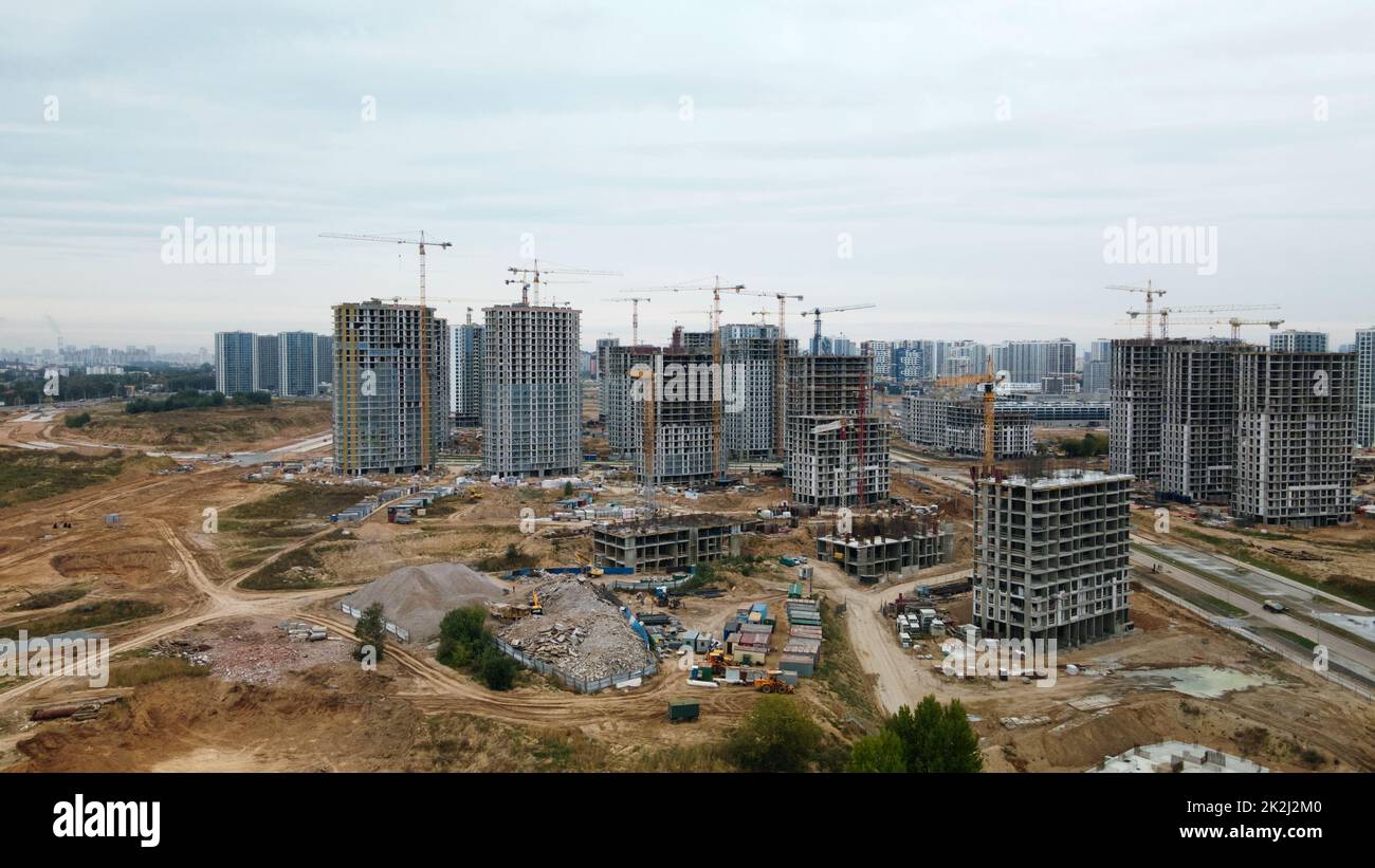 Construction site of a new city block. Construction of multi-storey ...