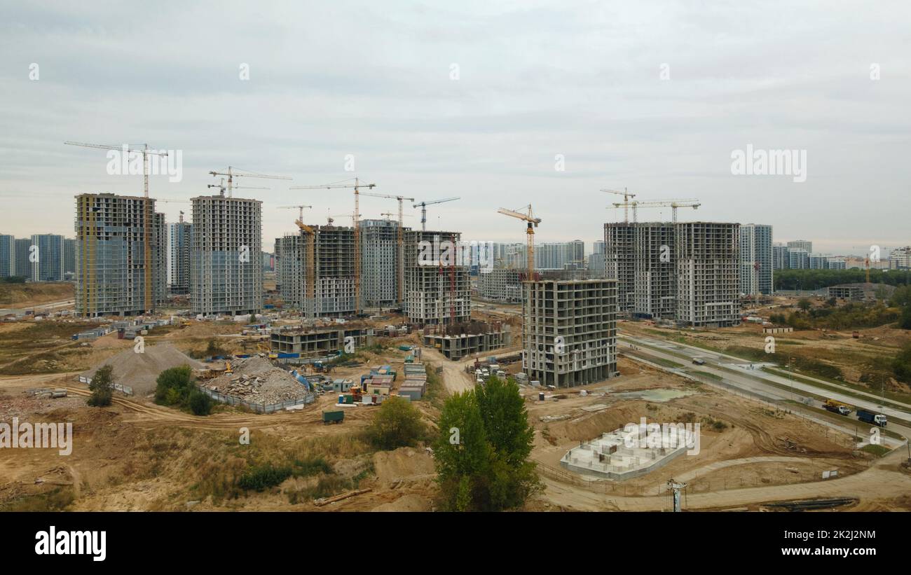 Construction site of a new city block. Construction of multi-storey ...