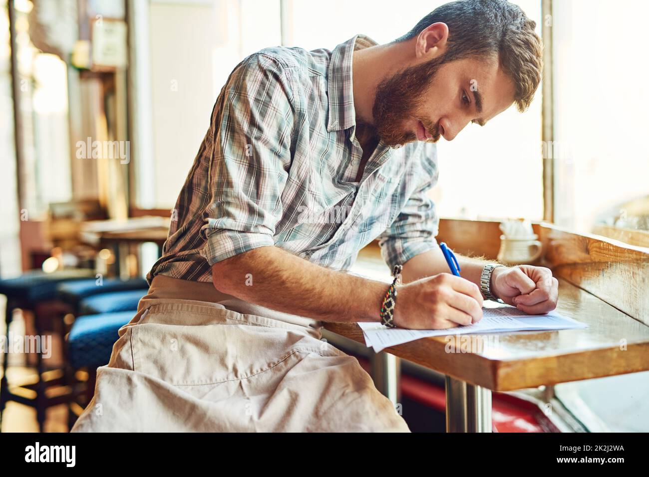 Male shop owner interior hi-res stock photography and images - Alamy