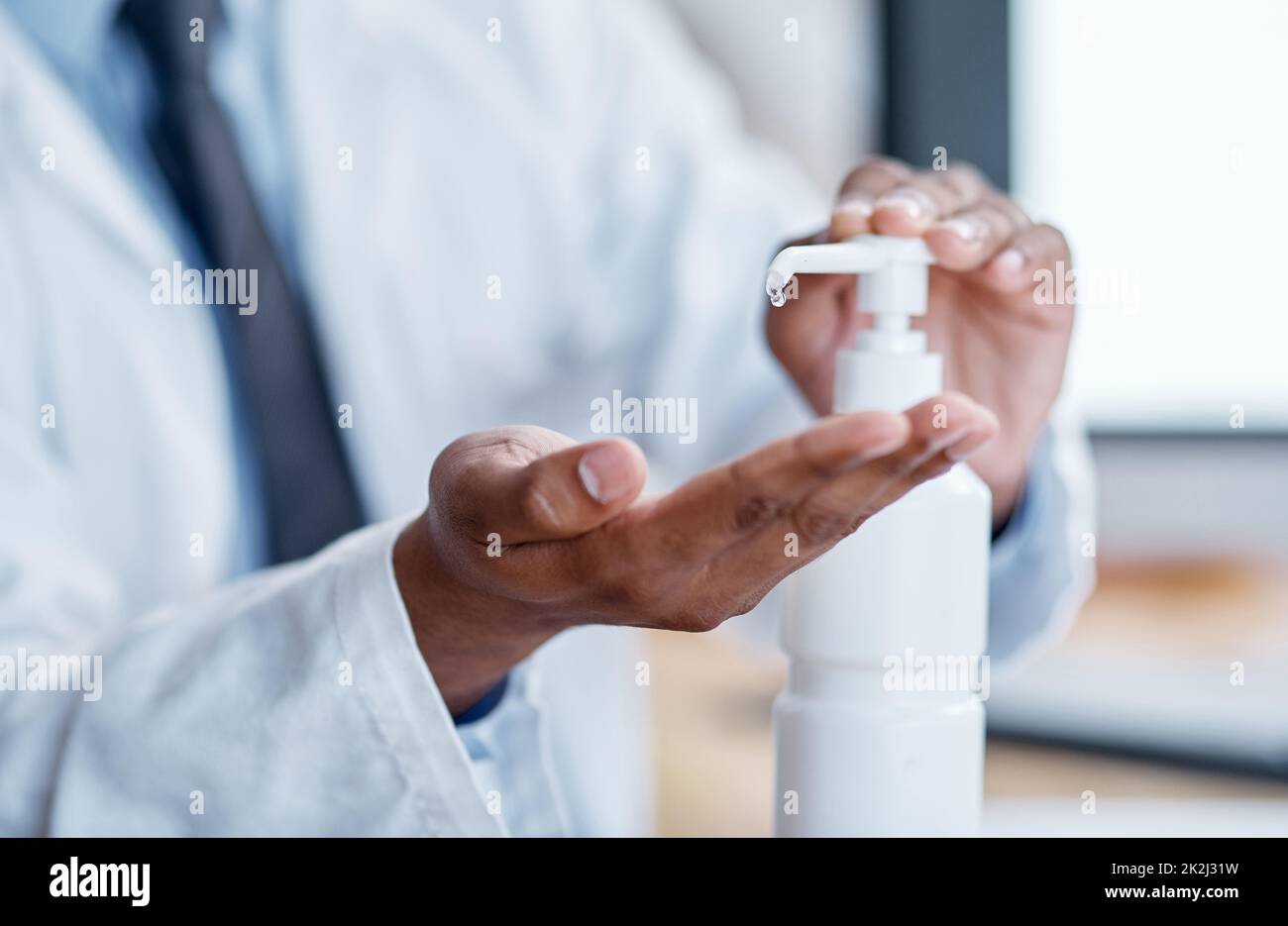 Killing bacteria on the regular. Closeup shot of an unrecognisable ...