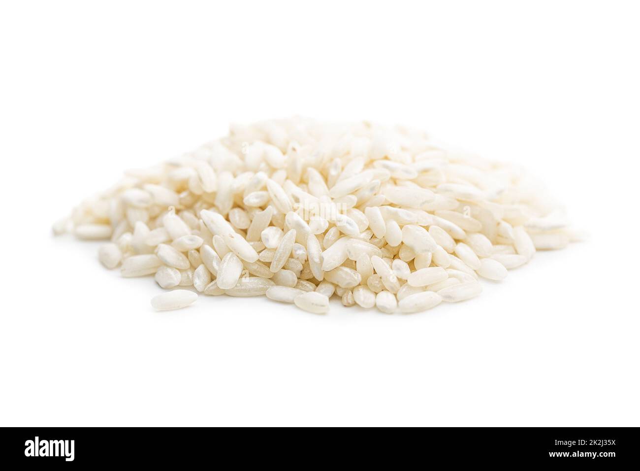 Uncooked Carnaroli risotto rice isolated on white background Stock ...