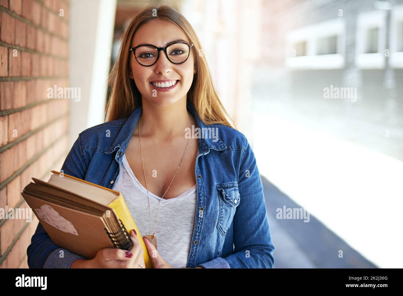 Female college student standing campus hi-res stock photography and ...