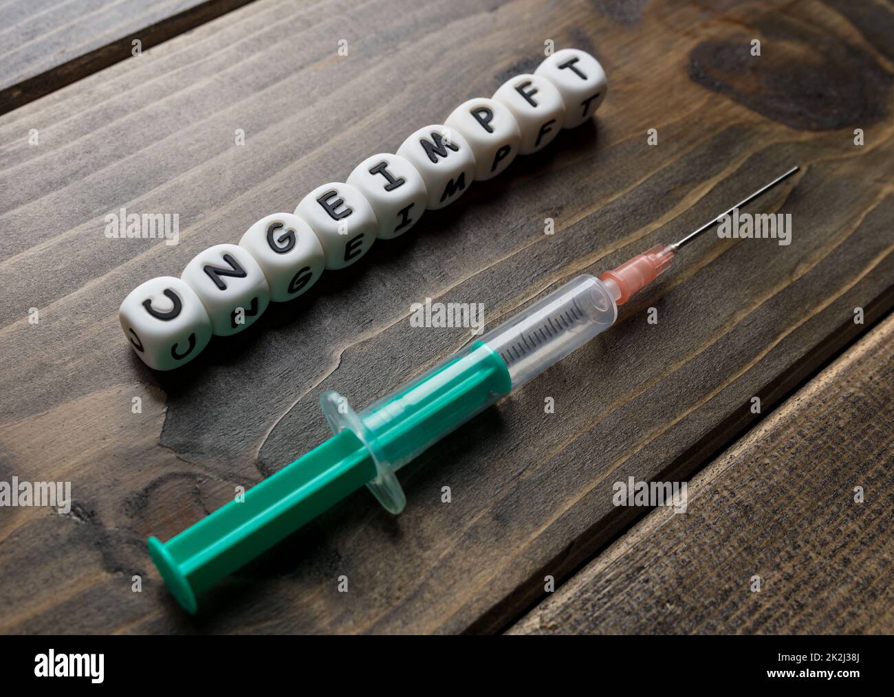 Corona virus Covid-19 vaccine text background in German Stock Photo - Alamy
