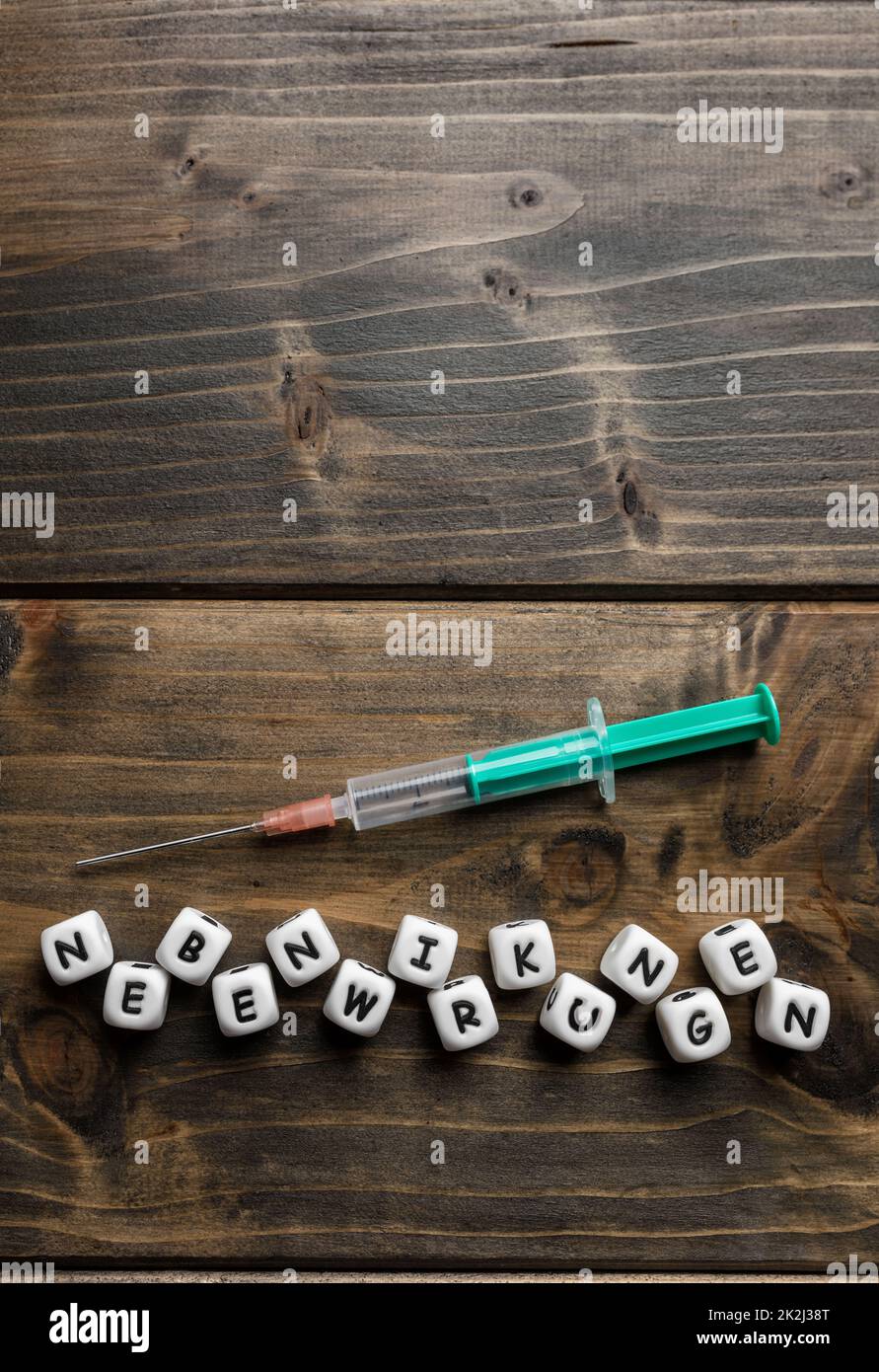 Corona virus Covid-19 vaccine text background in German Stock Photo - Alamy