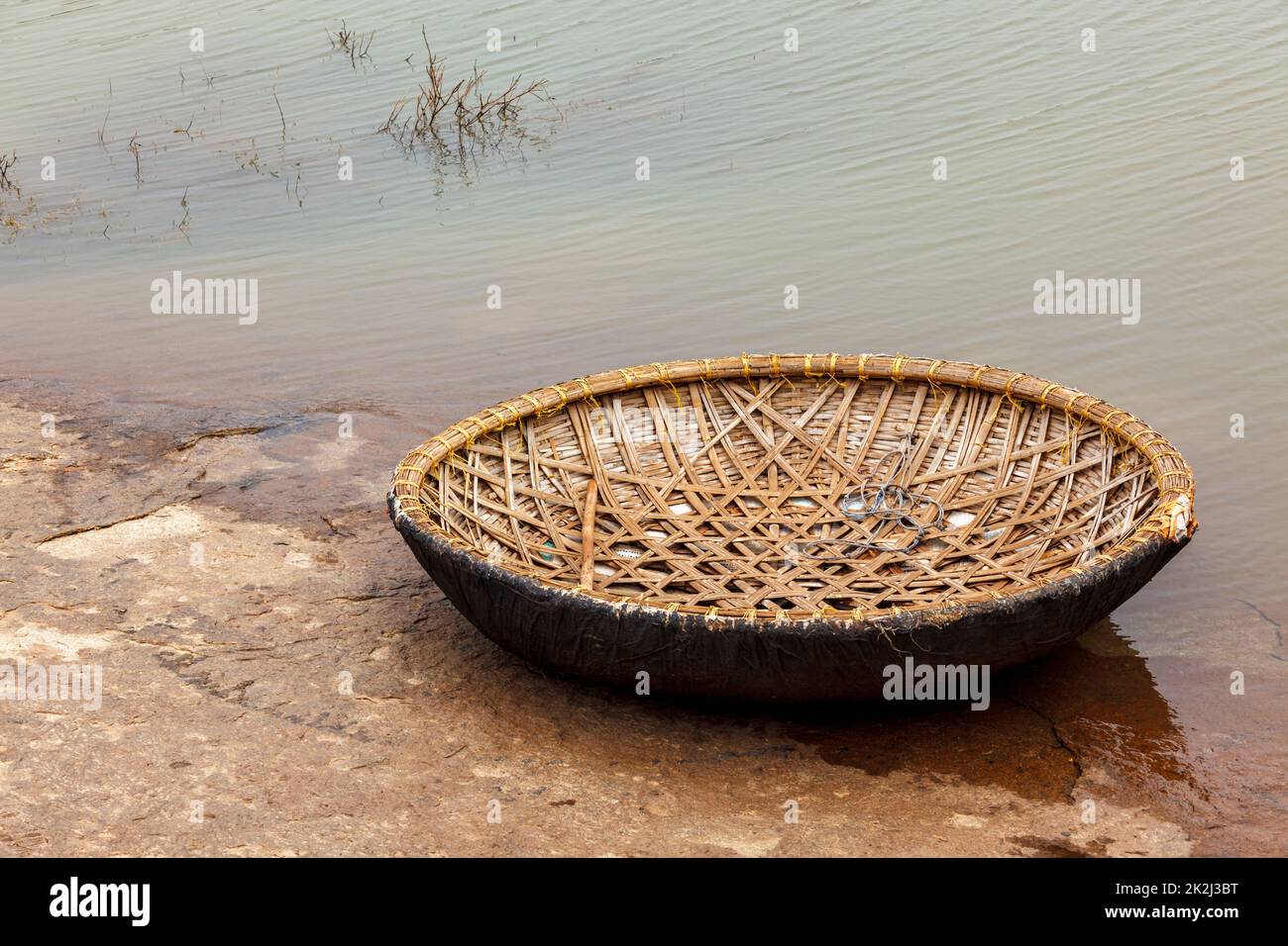 Wickerwork coracle boat in Hampi, Karnataka, India Stock Photo - Alamy