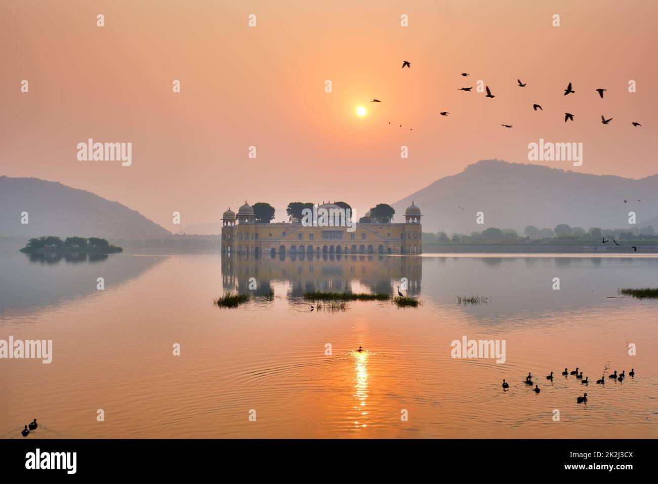 Tranquil morning at Jal Mahal Water Palace at sunrise in Jaipur ...