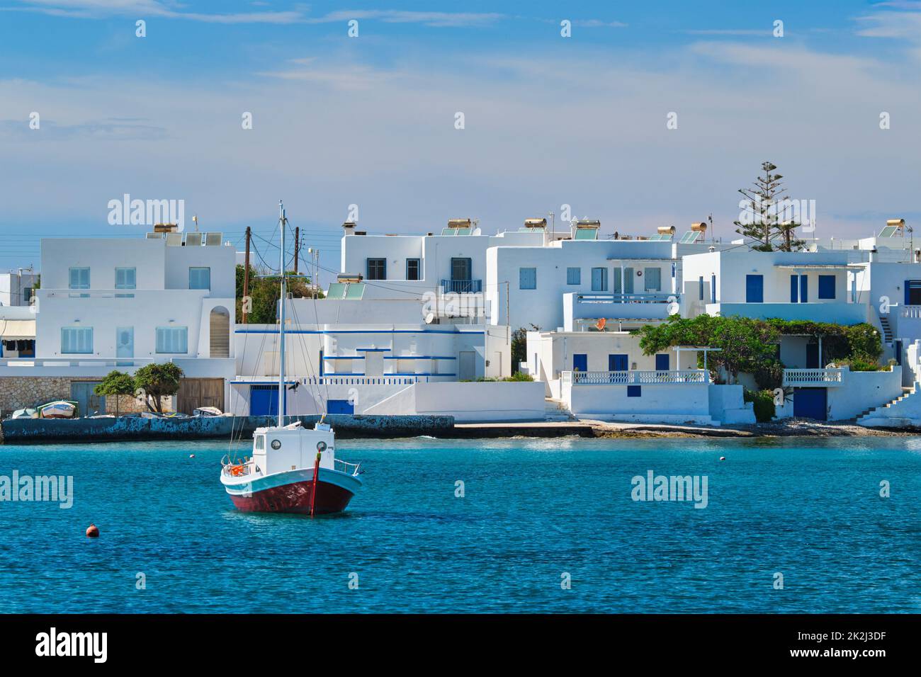The beach and fishing village of Pollonia in Milos, Greece Stock Photo ...