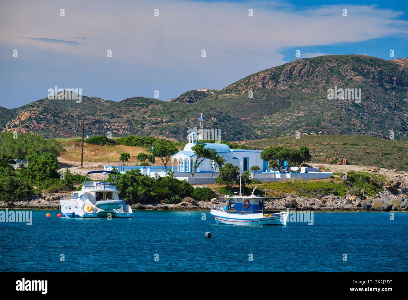 The beach and fishing village of Pollonia in Milos, Greece Stock Photo ...