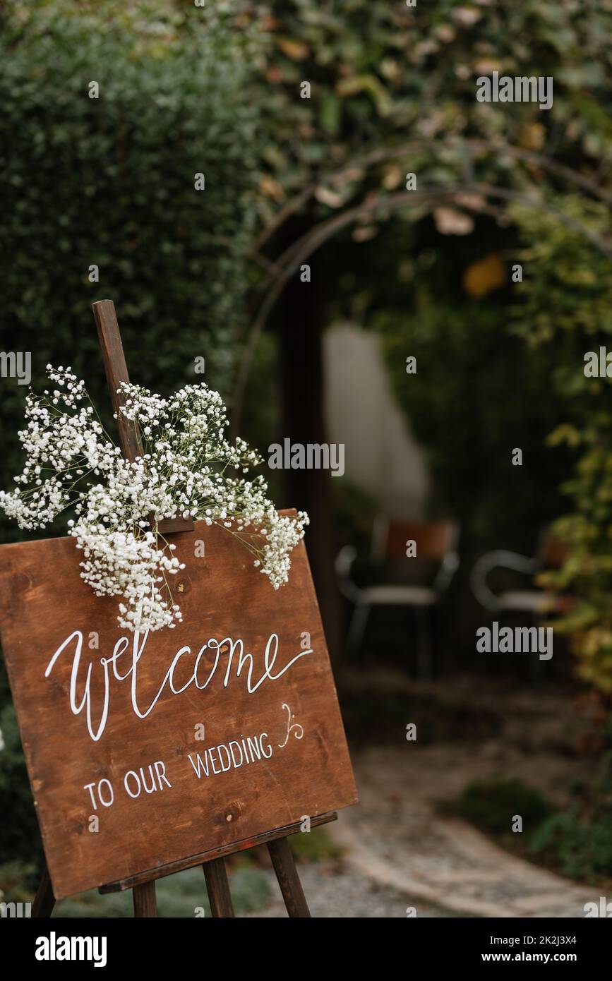 sign welcome to the event Stock Photo - Alamy