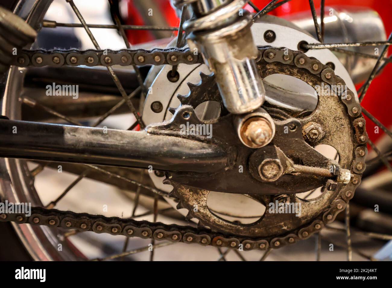 The rear wheel of a motorcycle with the gear for the drive Stock Photo ...